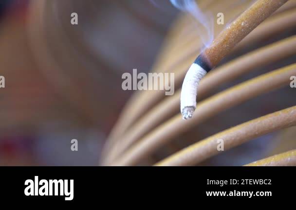 Burned coil swirl incense in Macau (Macao) temple, traditional Chinese ...