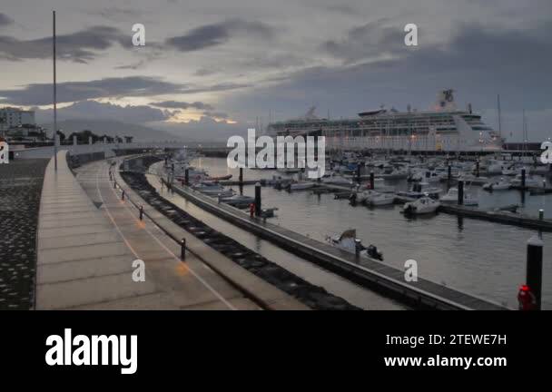 Sunrise Timelapse of the main sea port of Ponta Delgada. A large cruise ...