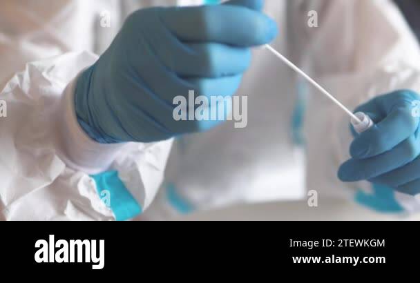 Process of coronavirus PCR antigen testing examination by nurse medic ...