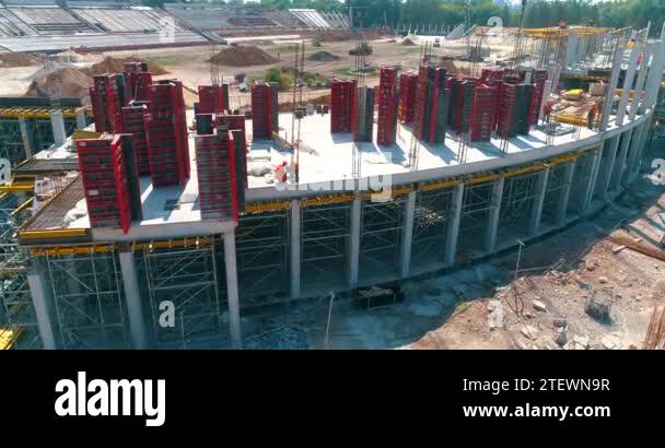 Construction process of a modern football stadium. Builders make ...