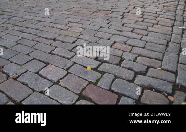 A view to the historical stone pavement in the old town street ...