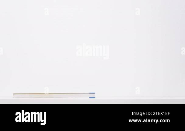 Stop Motion Animation Of Growing And Shrinking Stack Of Books Isolated On White Background