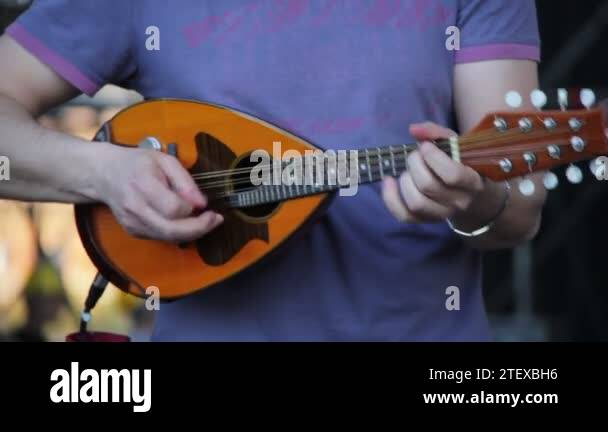 Hands playing mandolin guitar Stock Videos & Footage - HD and 4K Video ...