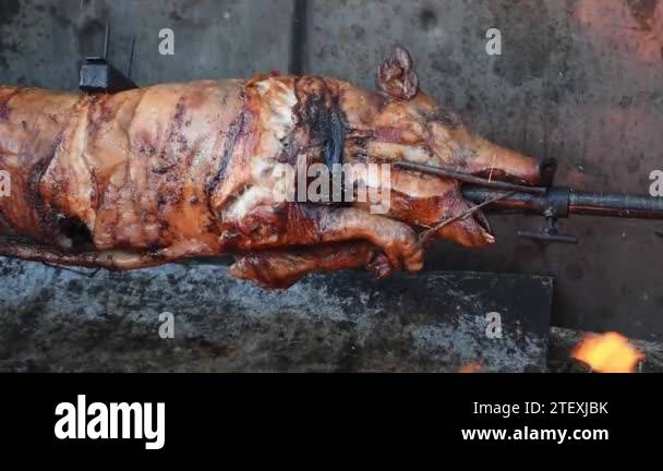 Roasting pig spit roast pig pork Stock Videos & Footage - HD and 4K ...