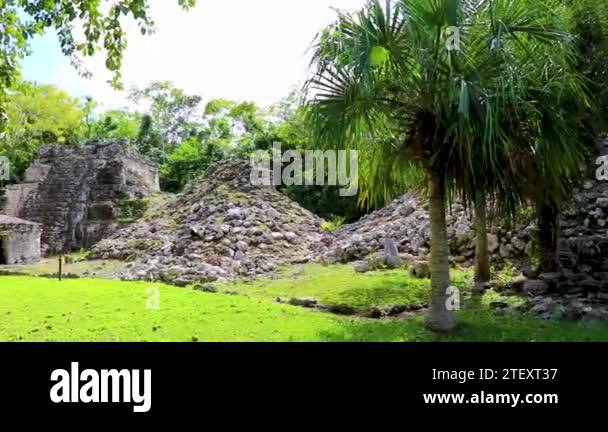Ancient Mayan site with temple ruins pyramids and artifacts in the ...