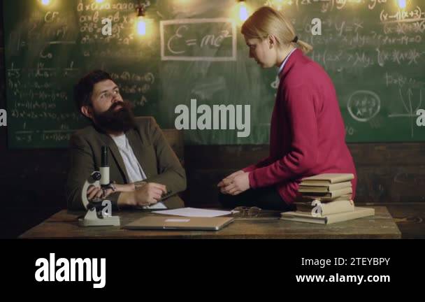 High school student. Teacher and college student in classroom. Female ...