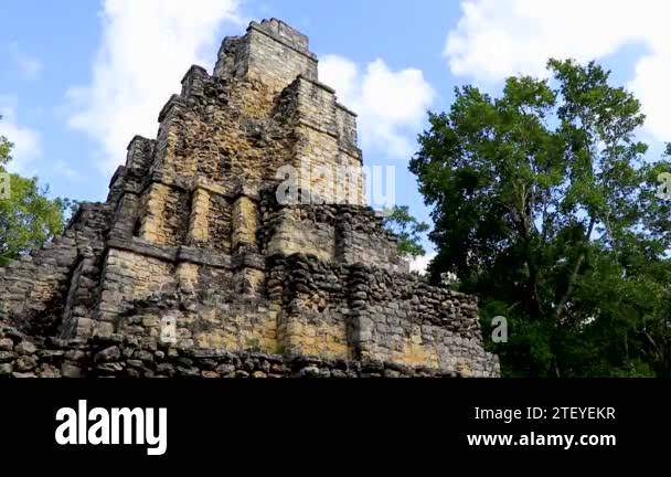 Ancient Mayan site with temple ruins pyramids and artifacts in the ...