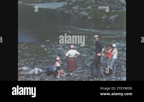 DOLOMITES, ITALY MAY 1965: Family mountain excursion scene in 60s Stock ...
