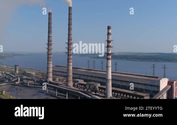 Thermal power plant. Large chp with high pipe 3 cooling towers. Smoke ...