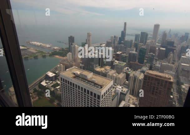 Pan camera view through window, aerial view, skyscrapers, high tall ...