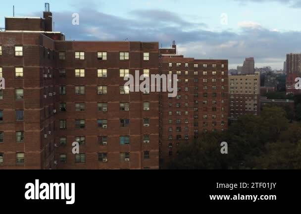 close aerial pan through housing project buildings in East Harlem New ...