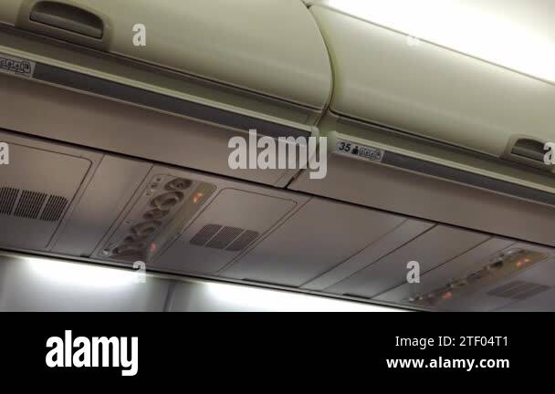 Hurghada, Egypt - January 5, 2022: Luggage racks in an airplane ...