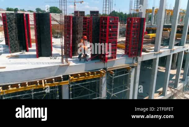 Construction process of a modern football stadium. Builders make ...