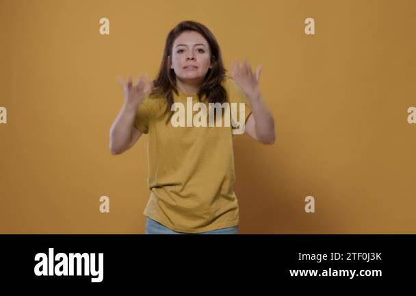 Nervous woman having a breakdown arguing moving hands and shouting ...