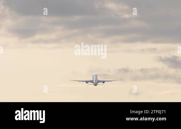 Civil jet plane gaining altitude after takeoff, rear view. Commercial ...