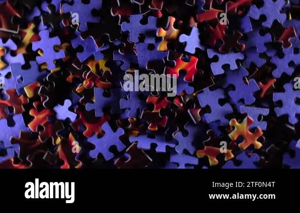 Background of Colored Puzzle Pieces that Rotating Counterclockwise ...