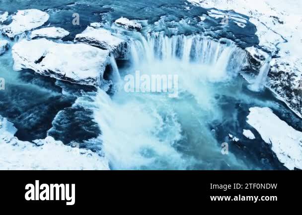 Godafoss, famous waterfall in Iceland, Frozen waterfall in winter, a ...