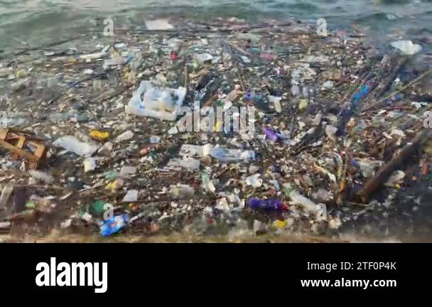 Garbage floating on the coast. Environmental pollution Rubbish plastic ...