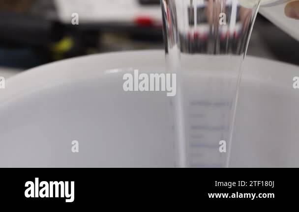 Mixing epoxy resin components with dye. One of the stages of ...