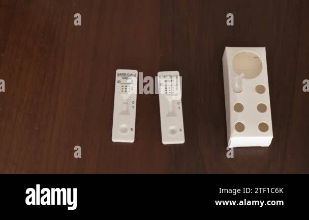 PCR antigenic rapid home tests side-by-side comparison positive and ...