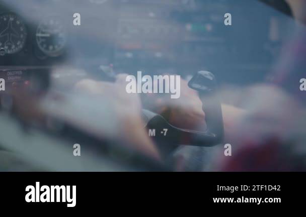 Aviator hands holding steering wheel starting plane engine preparing to ...