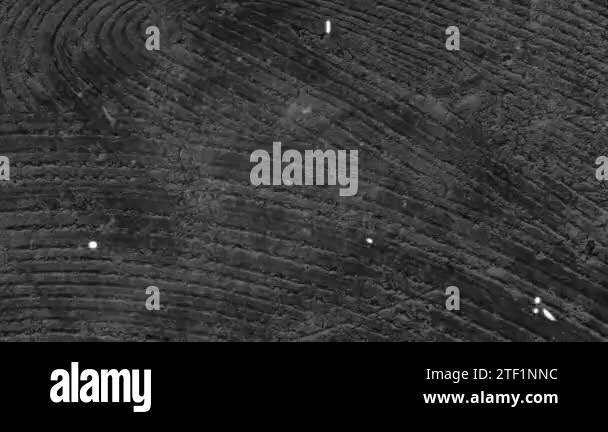 Animation of slipping film frame moving over changing wood grain ...