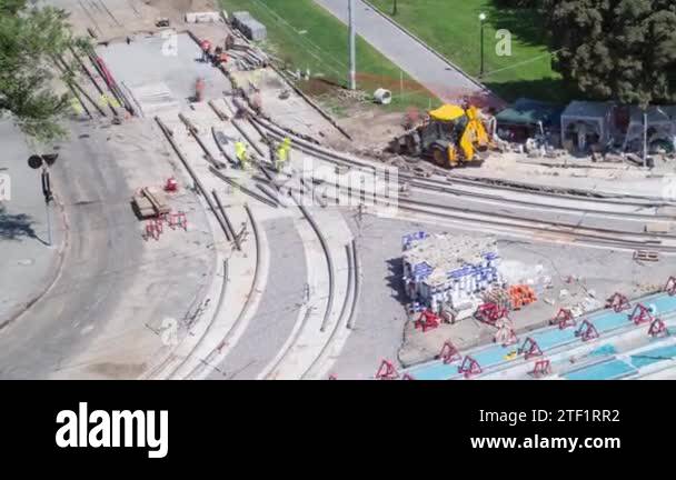 Repair works on the street timelapse. Laying of new tram rails on a ...