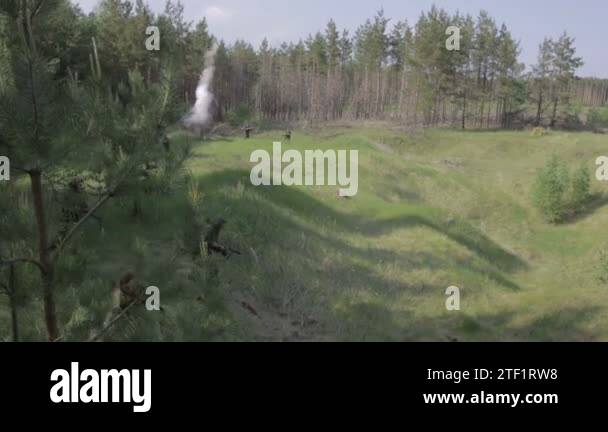 Combat firefight in the woods. World war II. The reconstruction of the ...