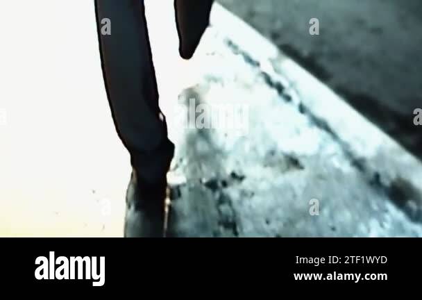 Glitched VHS video. City walk. Retro 90s. Defocused confident handsome ...