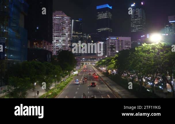 JAKARTA, INDONESIA - CIRCA 2020: jakarta city night time illuminated famous busy traffic street ...