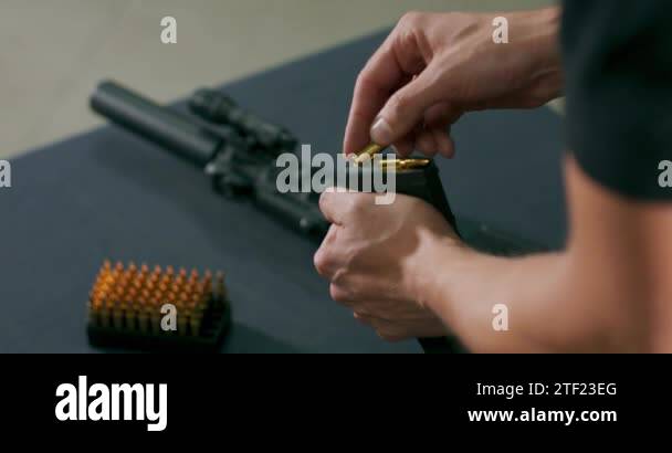 Self loading gun Stock Videos & Footage - HD and 4K Video Clips - Alamy