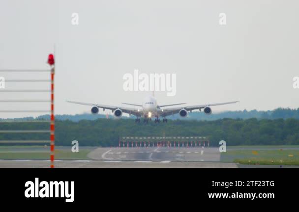 Widebody aircraft approaching landing, slow motion. Cinematic footage ...