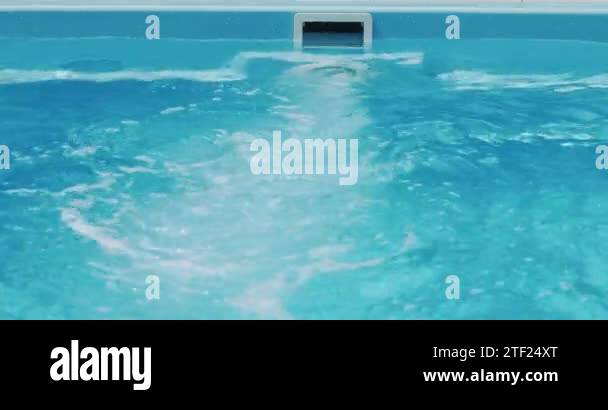 The countercurrent in the pool is a powerful flow of water. A swimmer ...