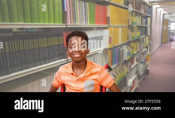 Animation of book week text over smiling african american schoolboy in ...