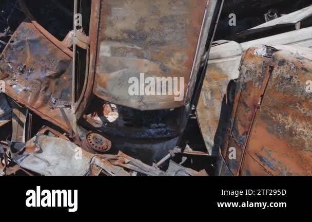 This stock video shows a dump of shot and burned cars in Irpin, Bucha ...