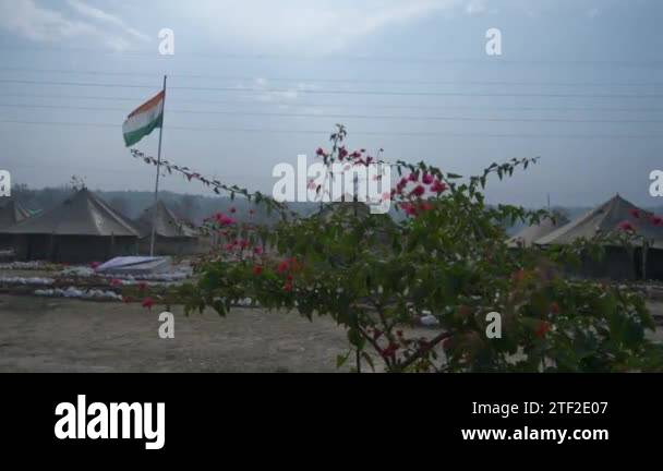 A waving Indian flag Tiranga installed at a Camping site in Himalayan ...