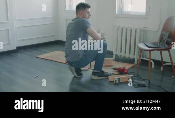 Repairman working inside home Stock Videos & Footage - HD and 4K Video ...