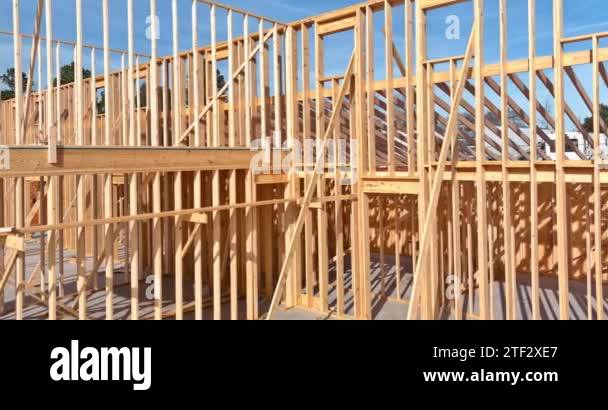 An aerial top view of stick built home under construction with wooden ...