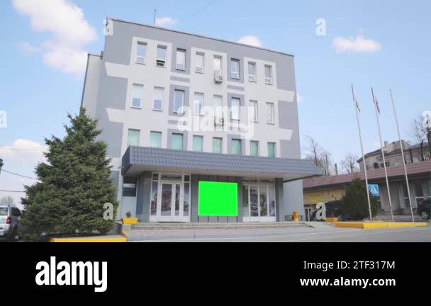 Office building with green screen. advertising banner green screen. An ...