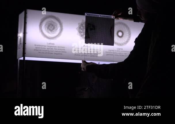 Artist man show interesting light effects on contemporary art ...