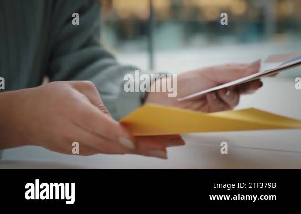 Close-up female hands holds envelopes letters correspondence receive ...