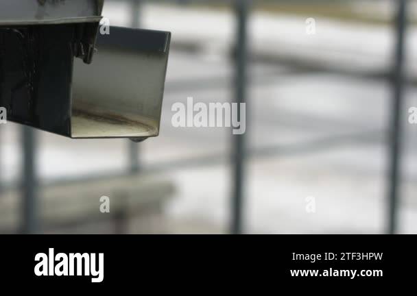 Close view of raindrop fallen from steel roof gutter Stock Video ...