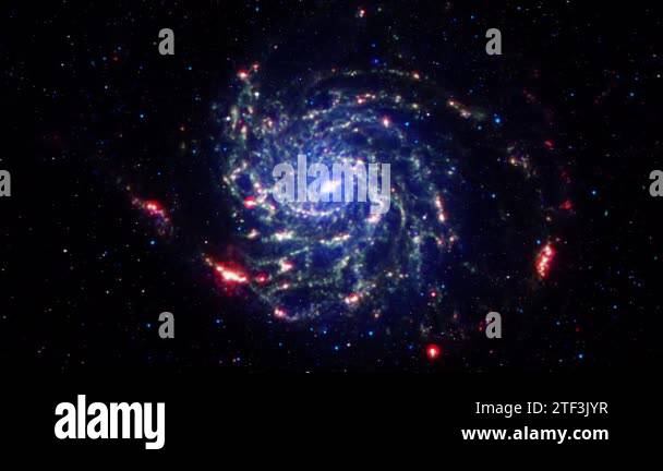 Seamless loop galaxy exploration through outer space towards glowing ...