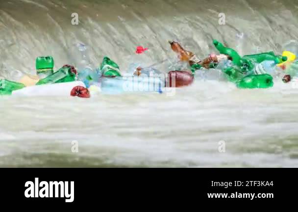 Water pollution by plastic waste in the river. Terrible plastic ...