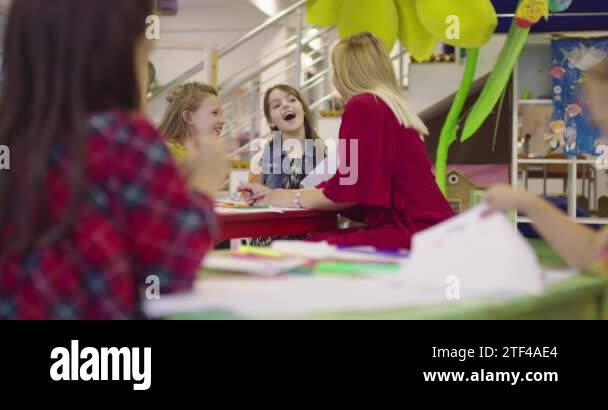 Primary group school children playing classroom Stock Videos & Footage ...