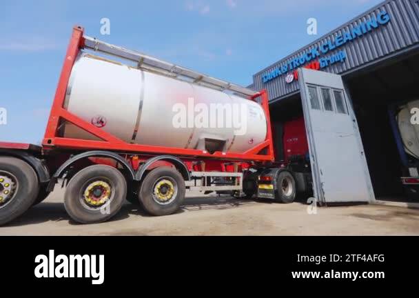 Tank and truck cleaning. A truck with a tank truck leaves the tank ...