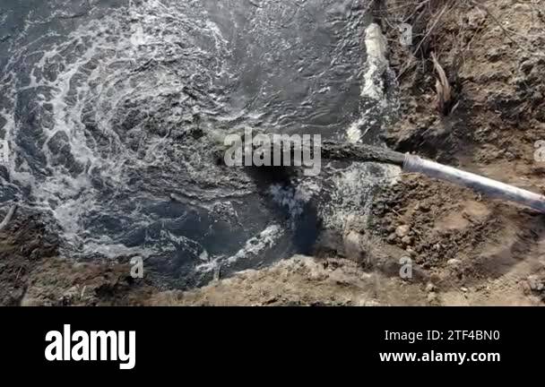 Dirty water flows from the pipe. Aquatic pollution. Ecological ...