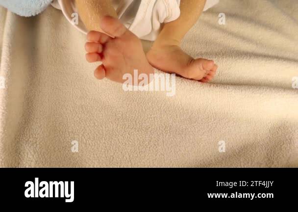 Newborn baby 's feet. as symbol of Moments of happy family. Family ...
