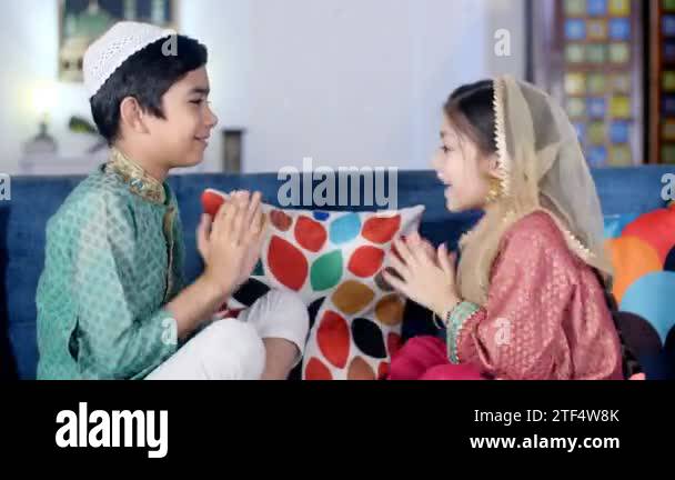 Happy Muslim kids having fun while playing patty-cake hand-clapping ...