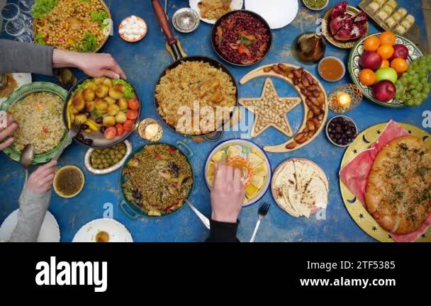 Family Ramadan dinner. Muslim people gathering to break their fast ...